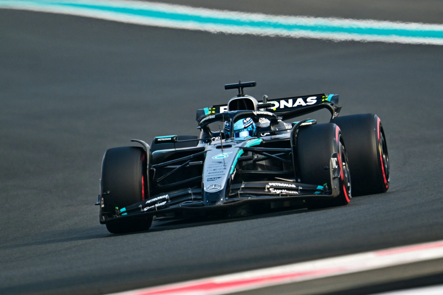 Russell tops practice times to outpace title-chasing trio